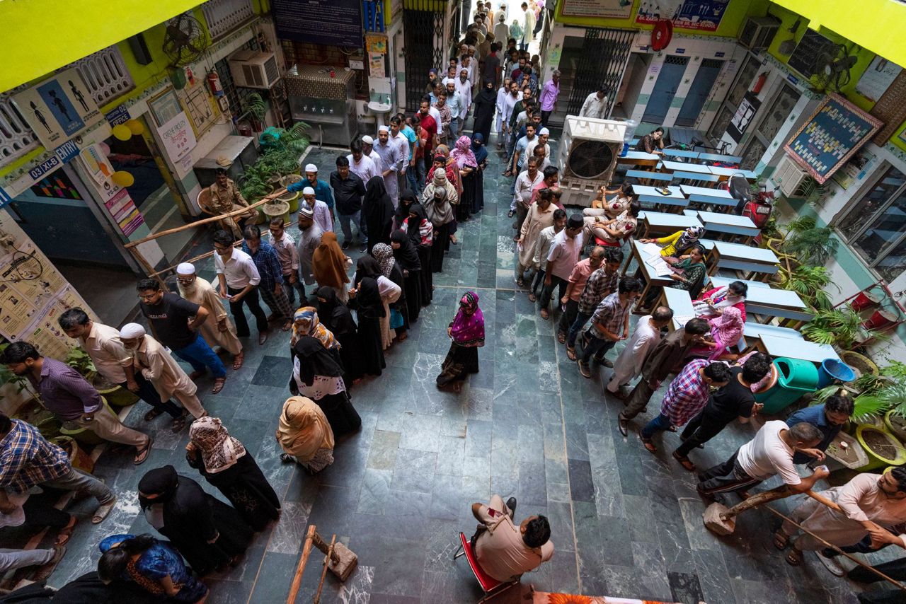 Millions vote in India's grueling election with Prime Minister Modi's ...