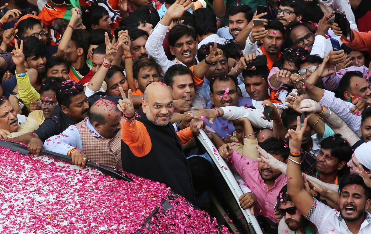 India's ruling party claims victory with wide lead in votes
