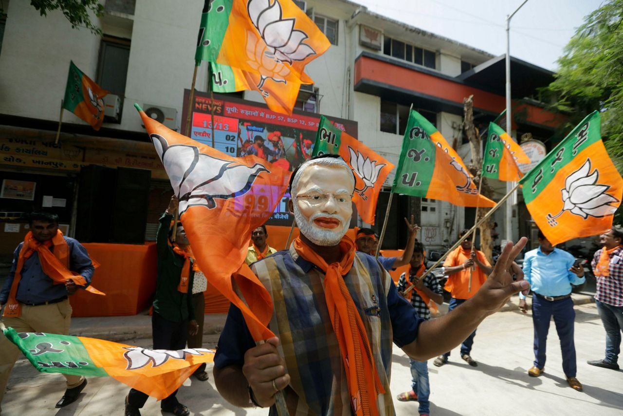 India's ruling party claims victory with wide lead in votes