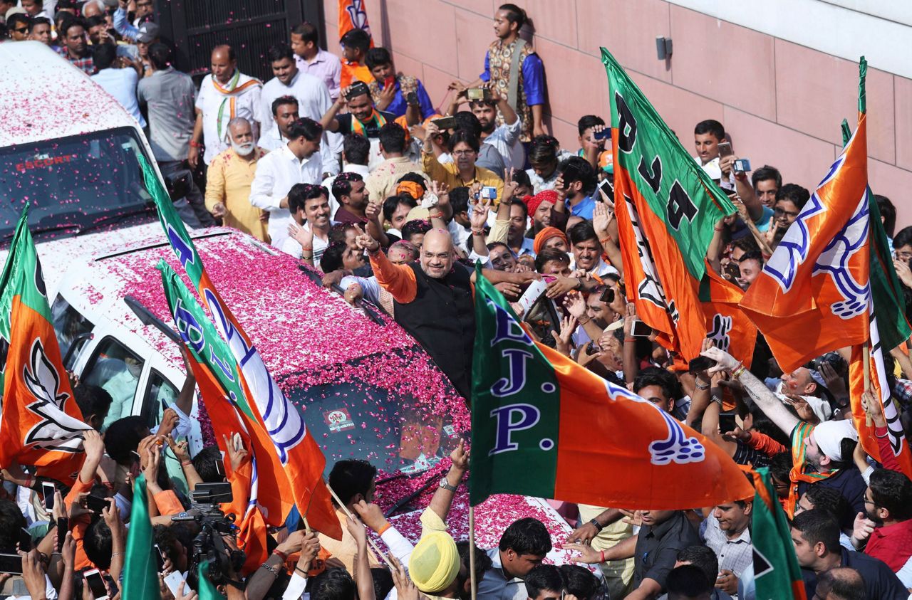 India's ruling party claims victory with wide lead in votes