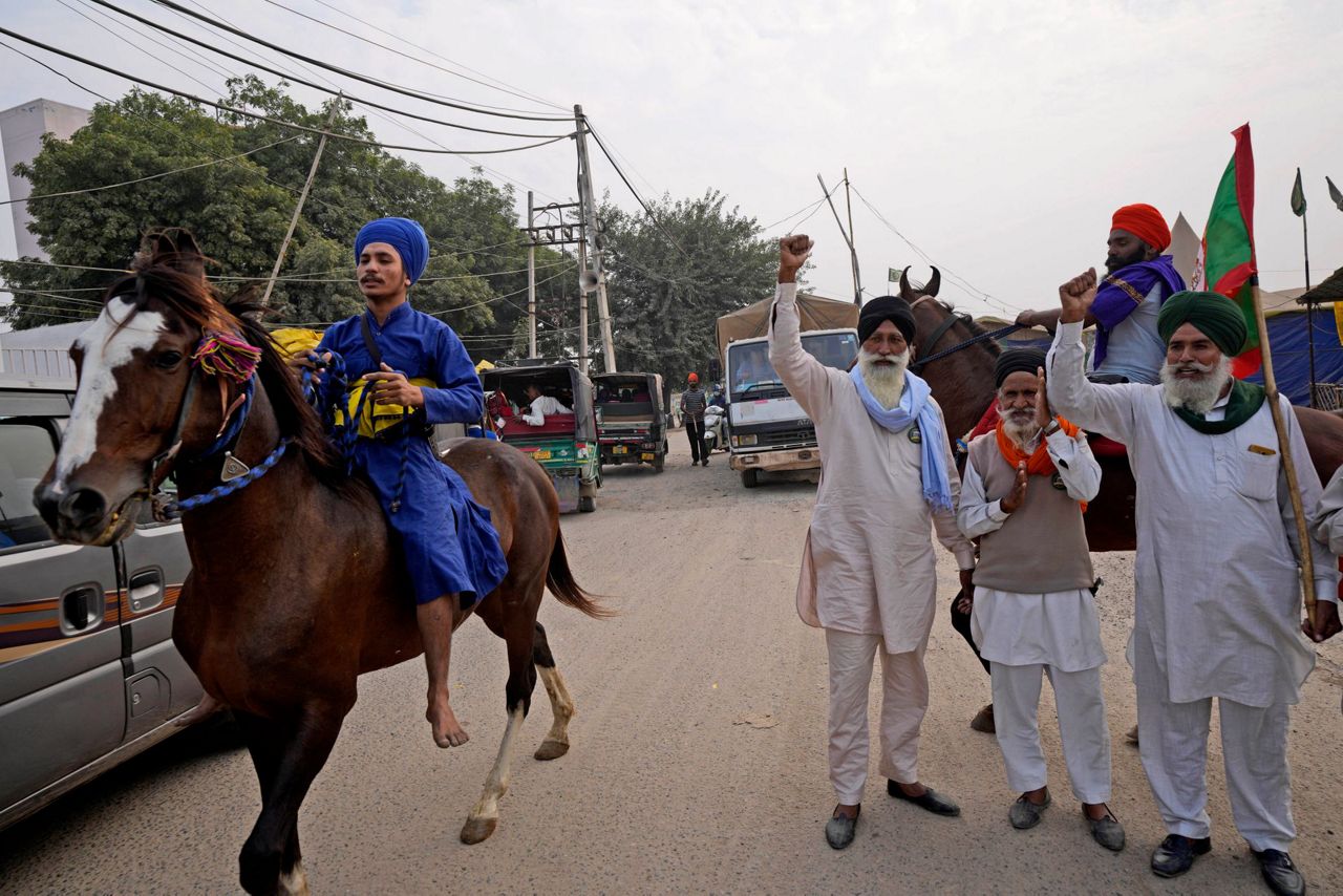 EXPLAINER: Why did Modi repeal India farm laws after a year?