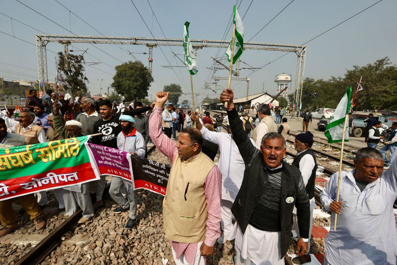 Farmers block trains in northern India to protest new laws