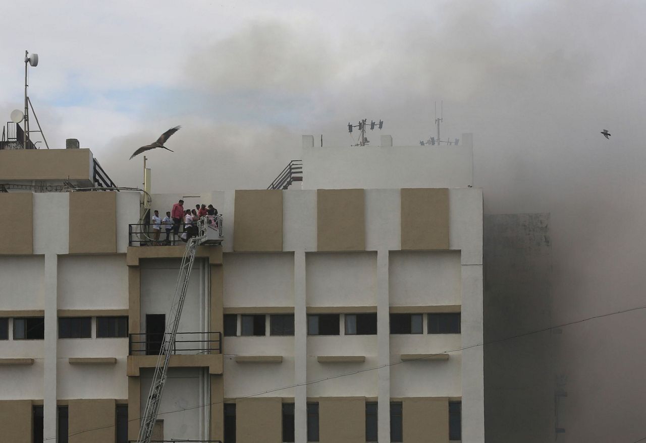 Dozens feared trapped in building on fire in Mumbai