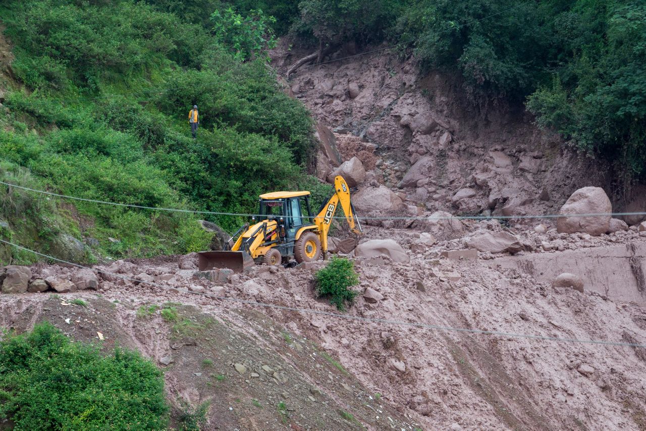 Heavy rains trigger floods and landslides in India's Himalayan region, leaving at least 22 dead