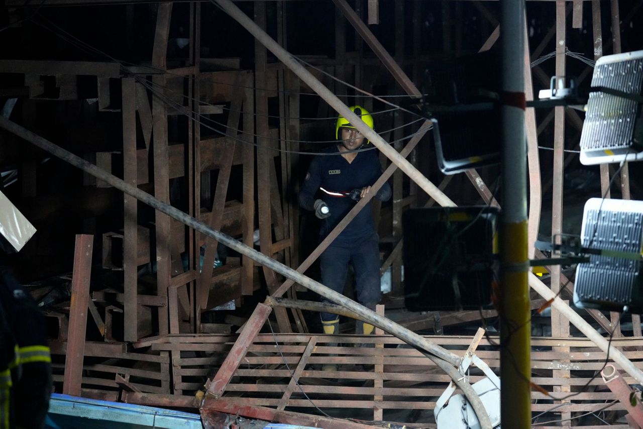 Billboard collapses onto people in Mumbai, India, killing at least 14 ...