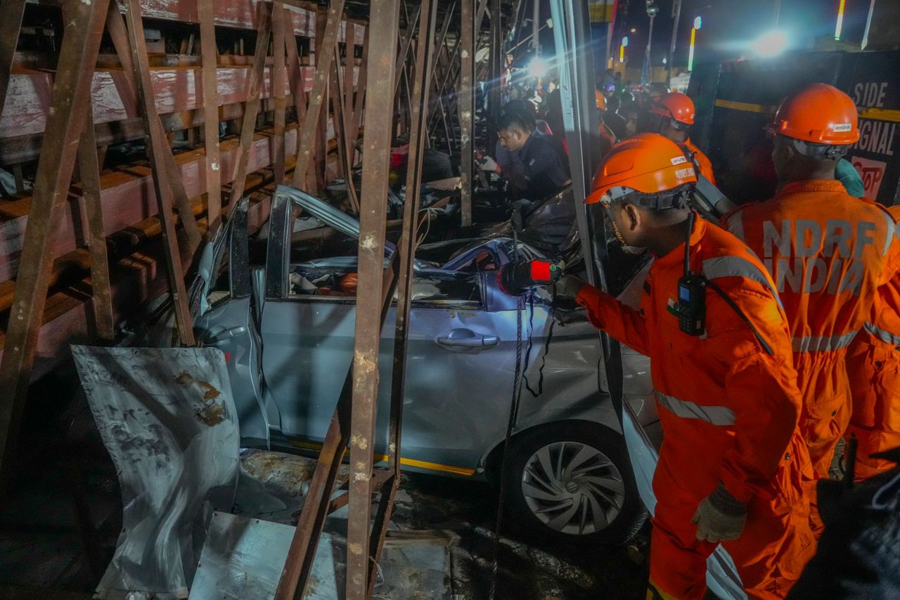 Billboard collapses onto people in Mumbai, India, killing at least 14 ...