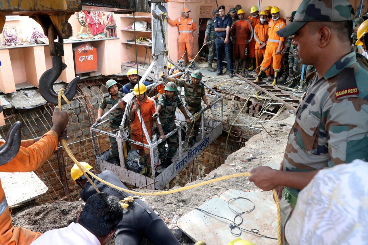 Covering over well at Indian temple collapses, killing 35
