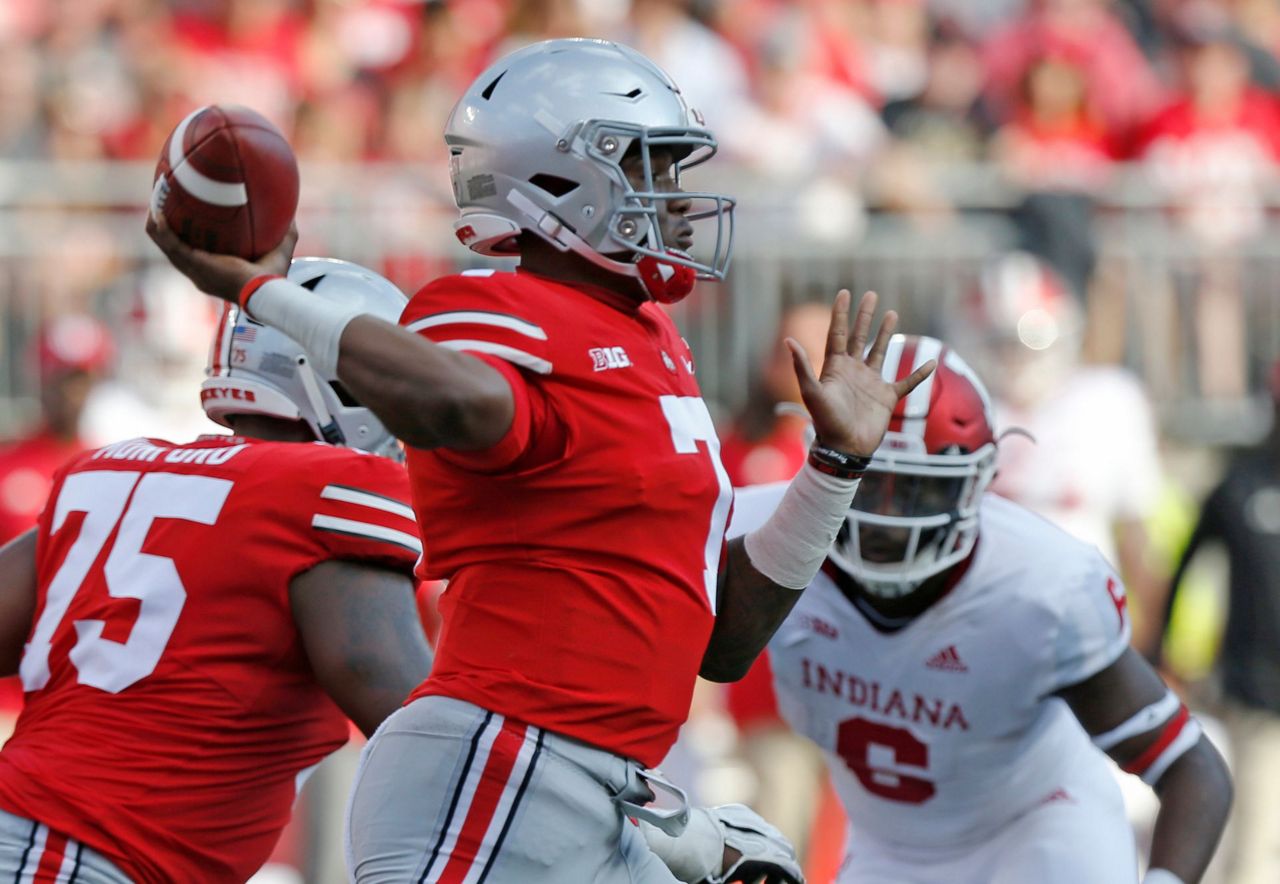 No. 3 Ohio State pulls away to beat pesky Indiana 49-26