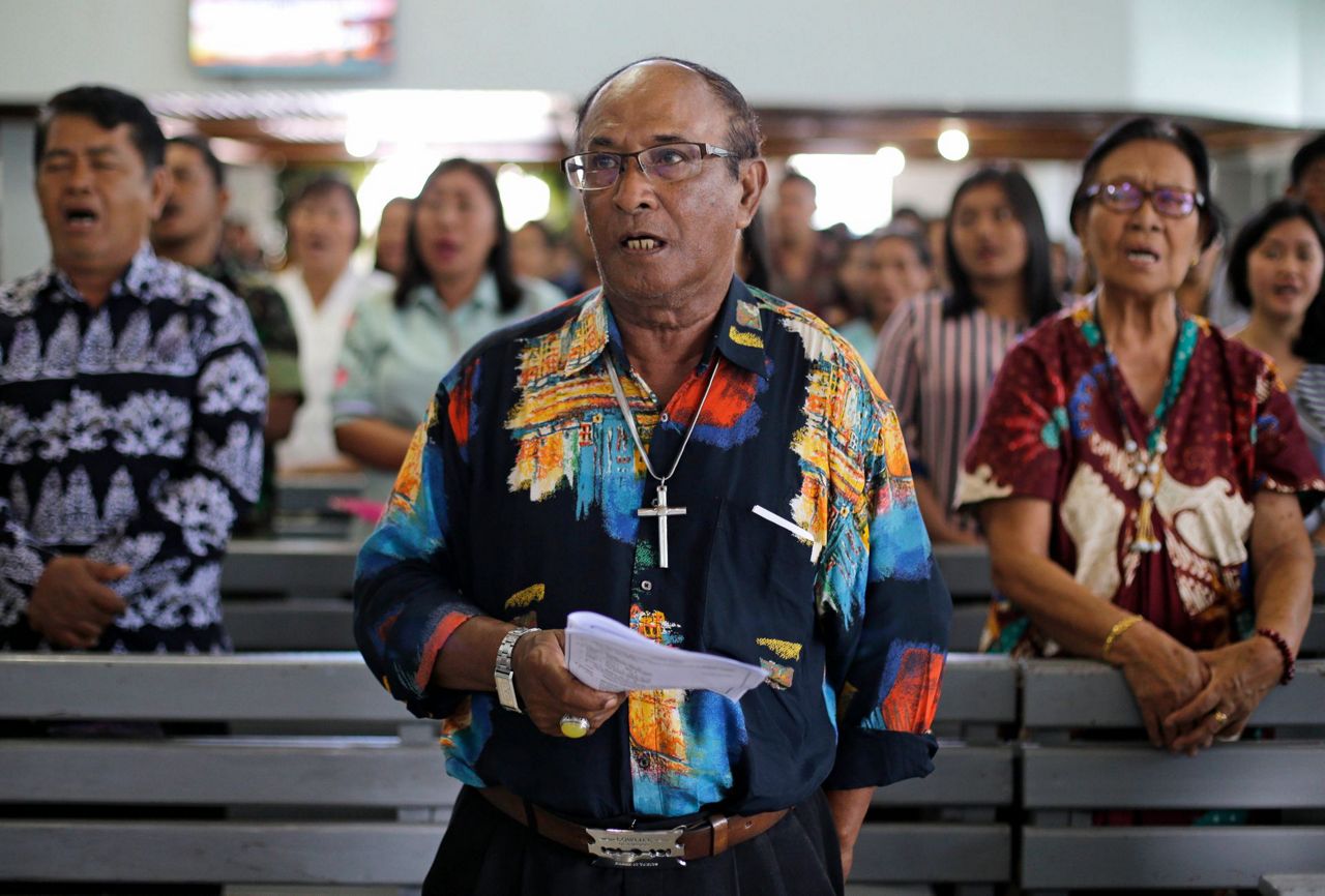 Christians seek solace in prayer after Indonesia disasters