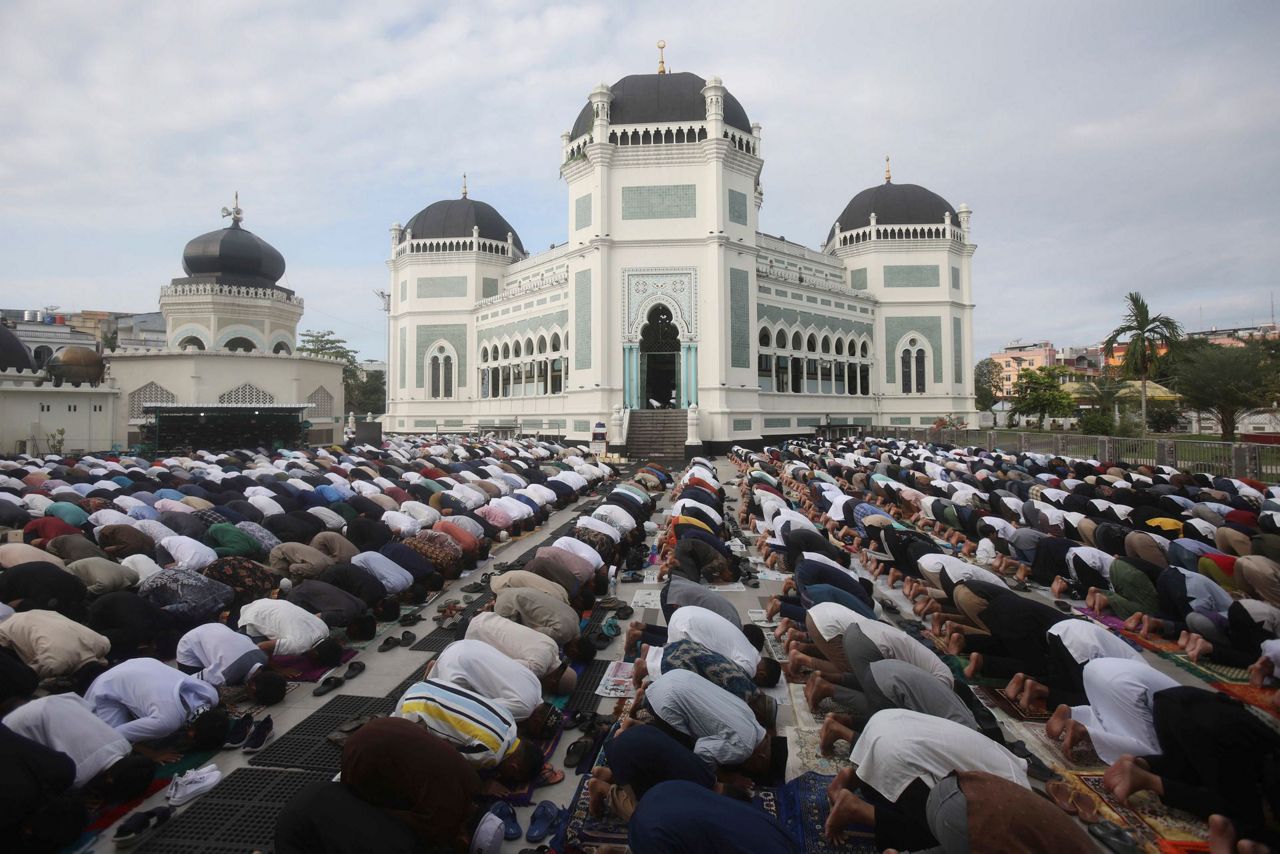 Indonesia's Muslims celebrate Eid al-Adha with feasts after disease ...