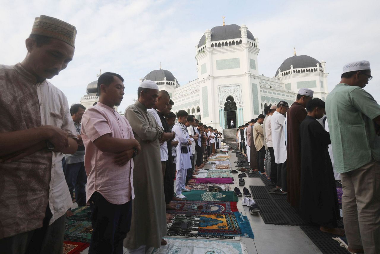 Indonesia's Muslims celebrate Eid al-Adha with feasts after disease ...