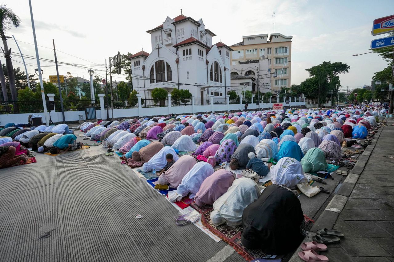 Indonesia's Muslims celebrate Eid al-Adha with feasts after disease ...