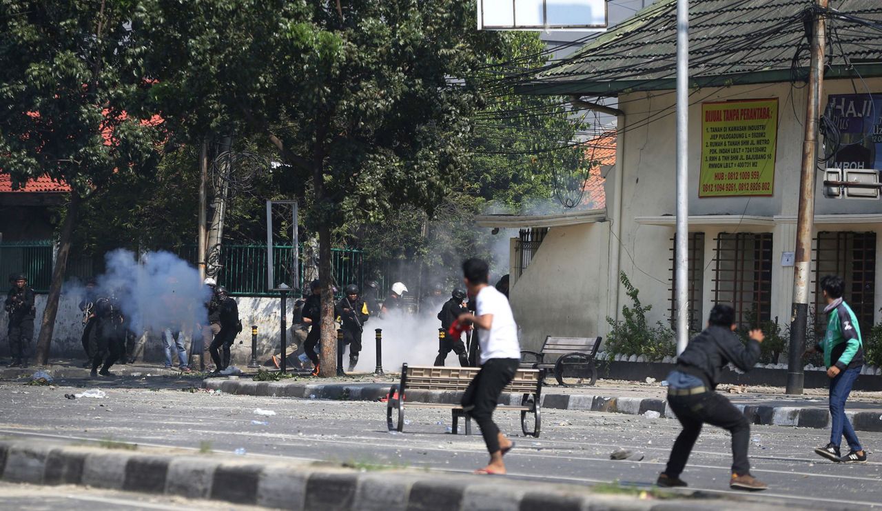 The Latest: Social media blocked due to Indonesia protests