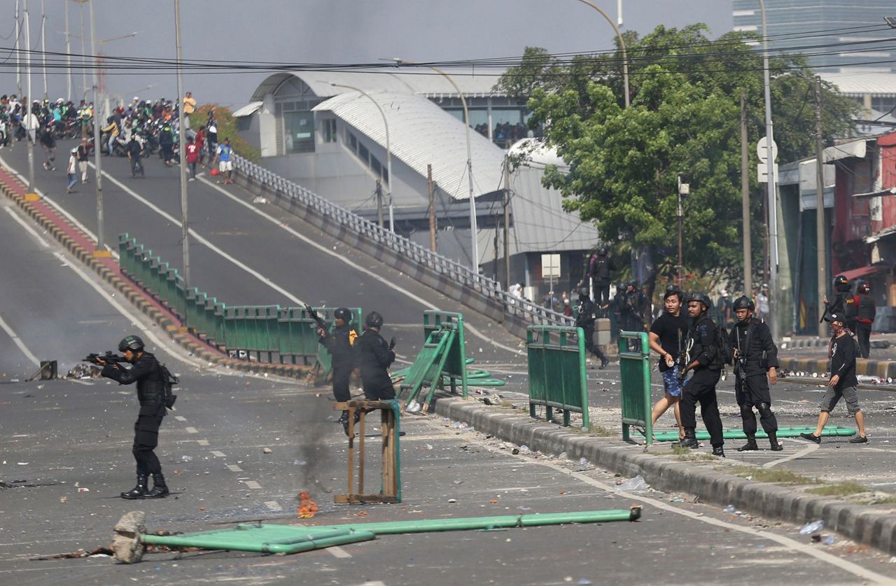 The Latest: Social media blocked due to Indonesia protests