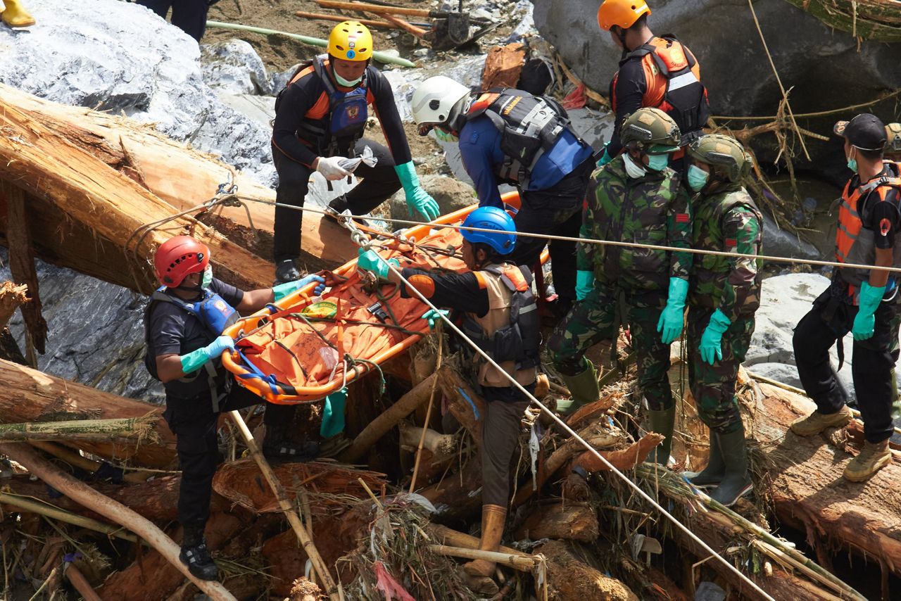 Over 800 people are still missing after flooding in Indonesia, Sri ...