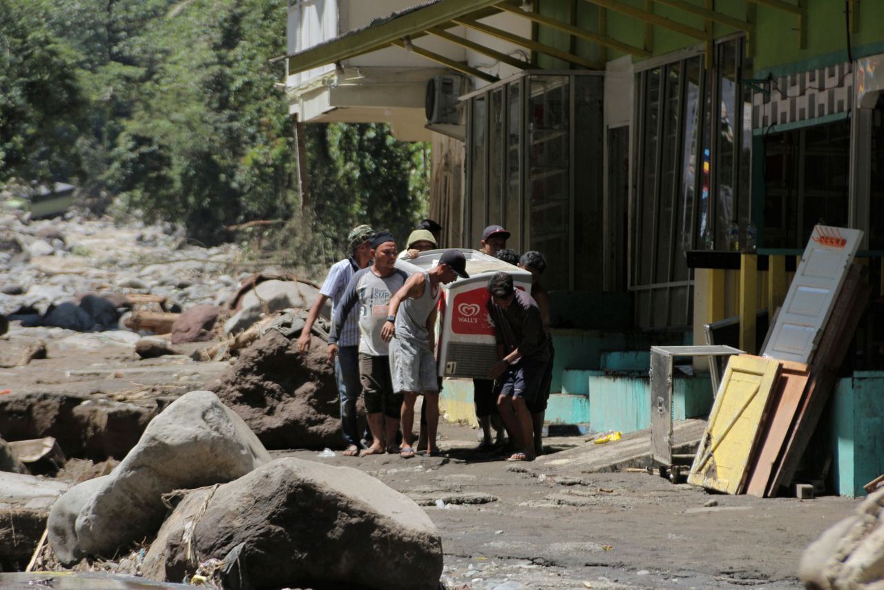 More bodies found in Indonesia after flash floods killed dozens and ...