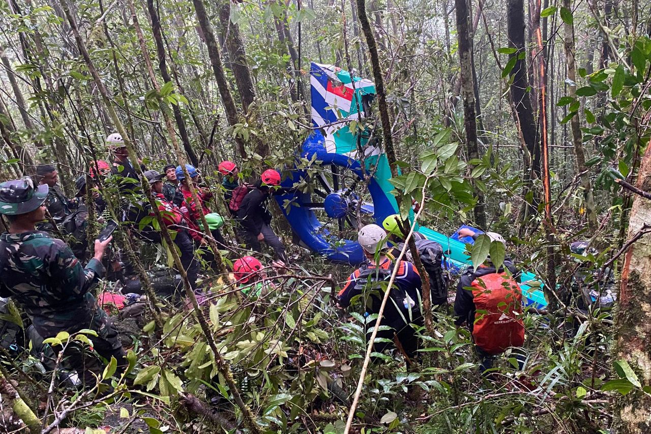 Indonesian rescuers find helicopter crash site on Borneo and recover 1 ...