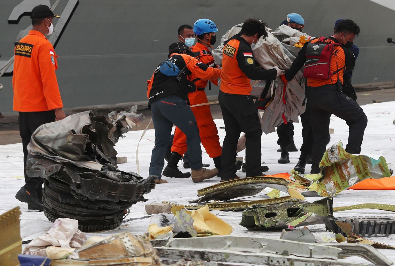 Indonesia intensifies search for crashed plane's black boxes