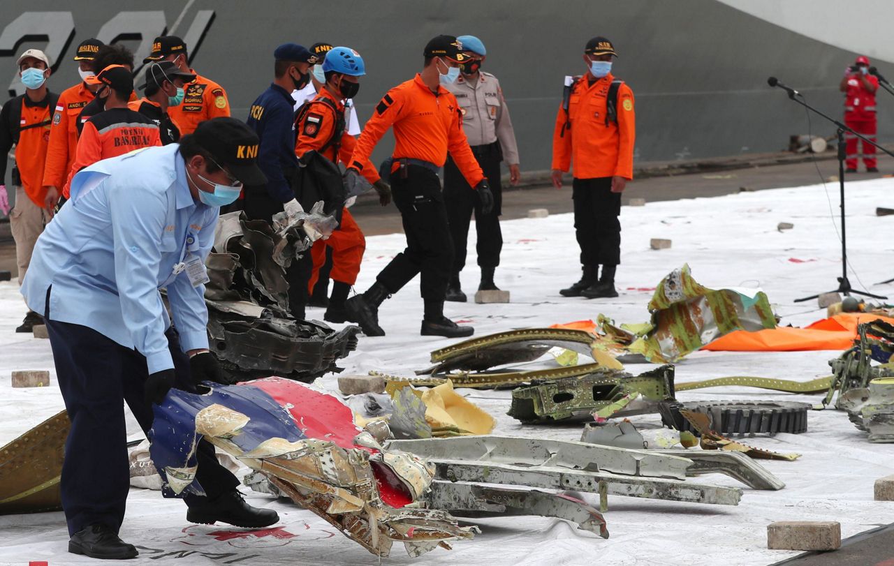 Indonesia intensifies search for crashed plane's black boxes