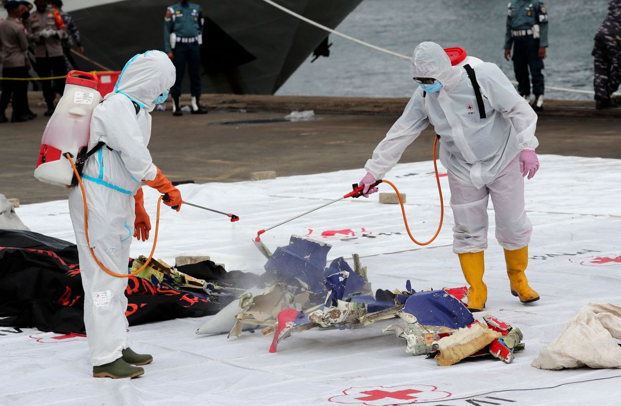 Body parts, debris found after Indonesia plane crash