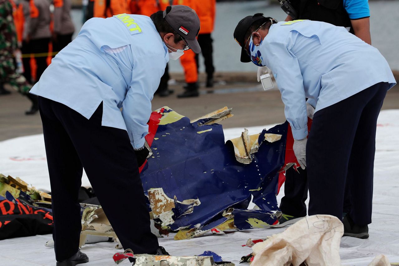 Body parts, debris found after Indonesia plane crash