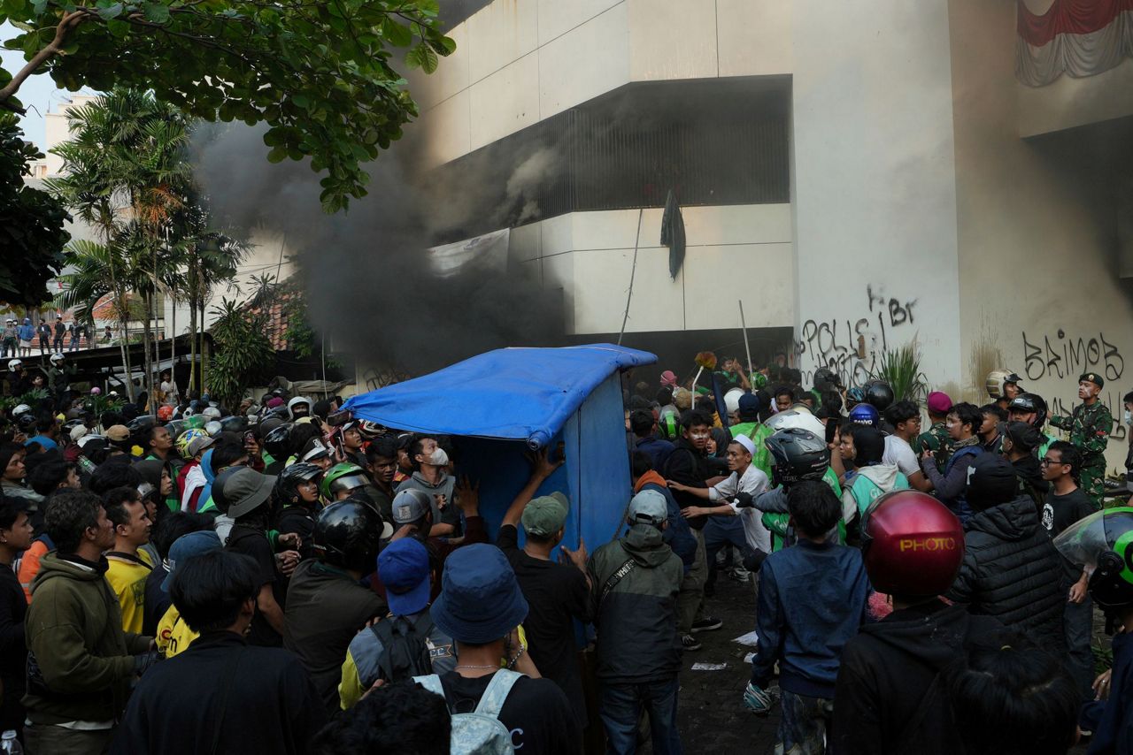 Tensions soar across Indonesia as protests against police erupt in ...