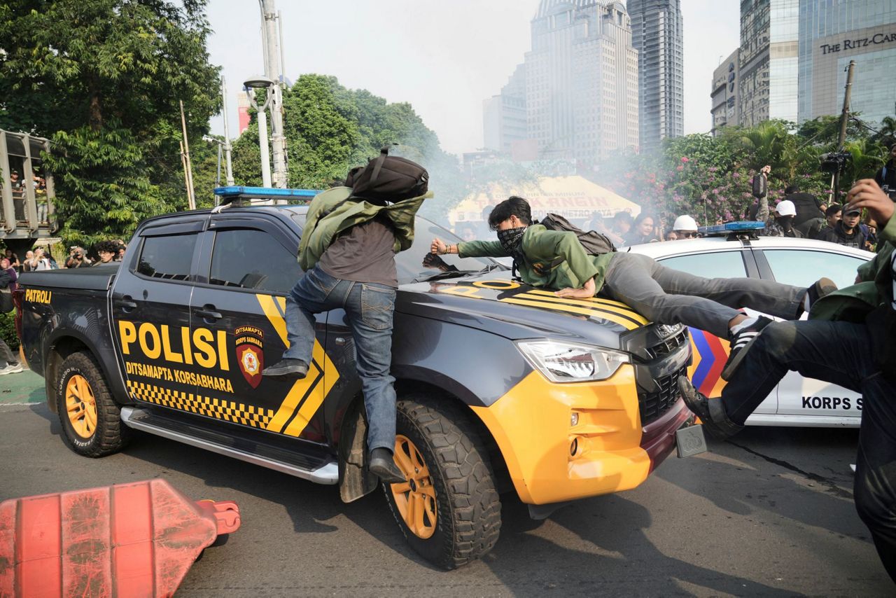 Tensions soar across Indonesia as protests against police erupt in ...