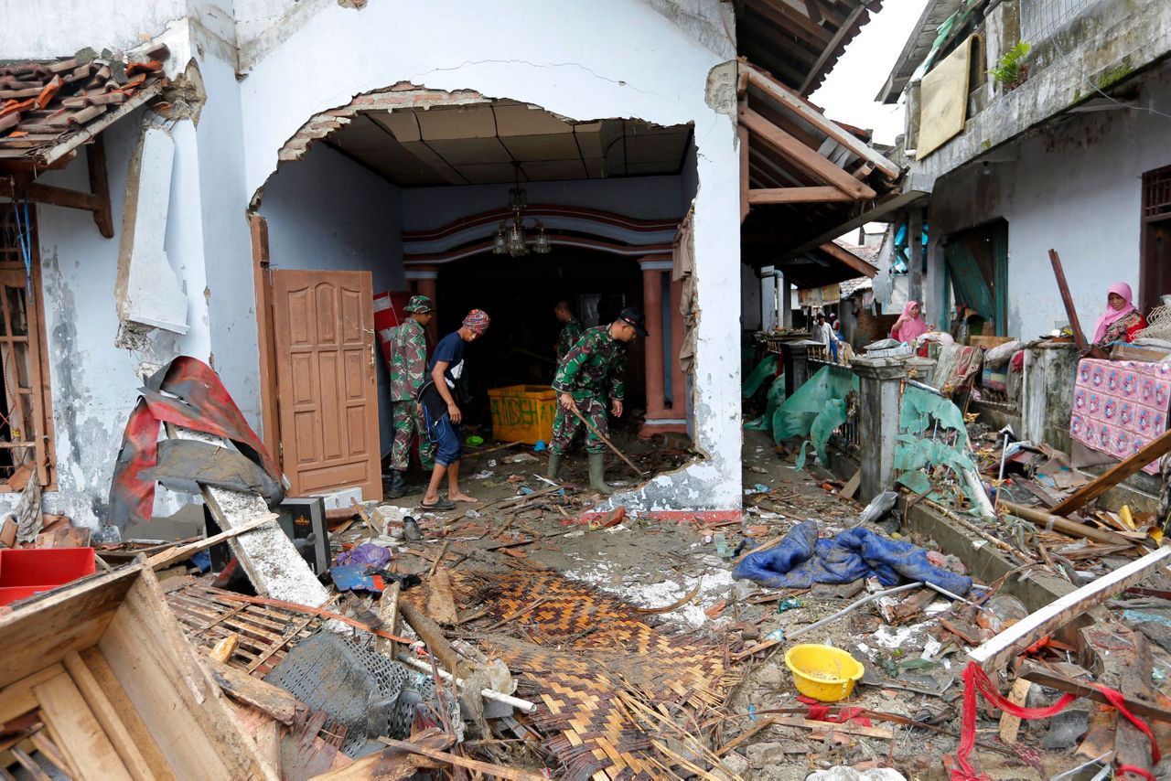 The Latest: Tsunami toll now 429 dead, thousands homeless