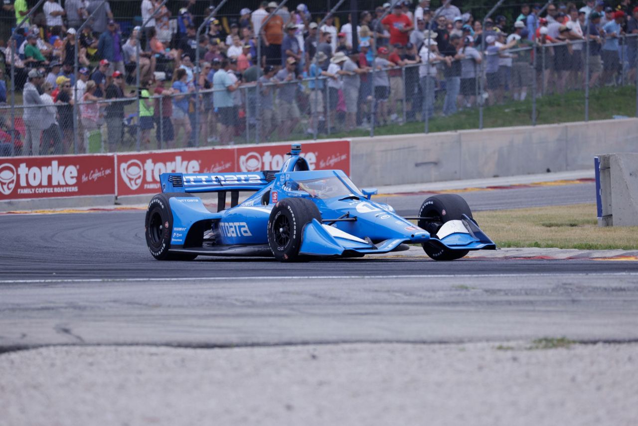 Palou makes late surge to win IndyCar race at Road America