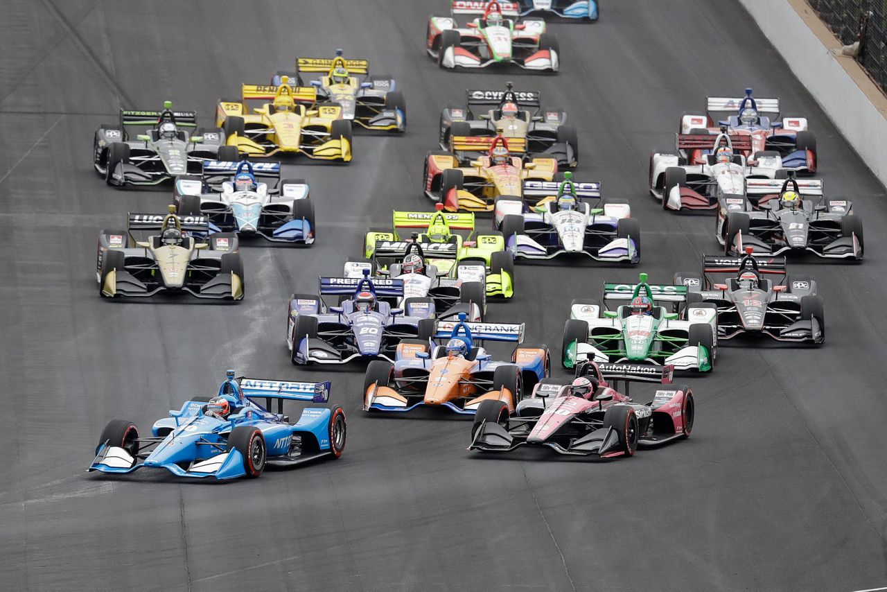 Pagenaud earns 3rd IndyCar GP win with splashy move in rain