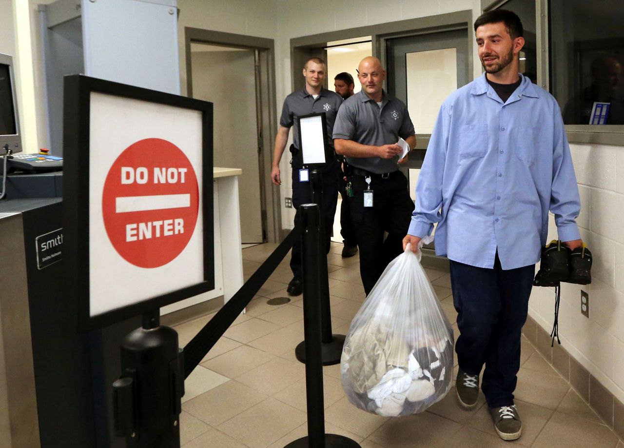 Jails, prisons slowly loosen resistance to addiction meds