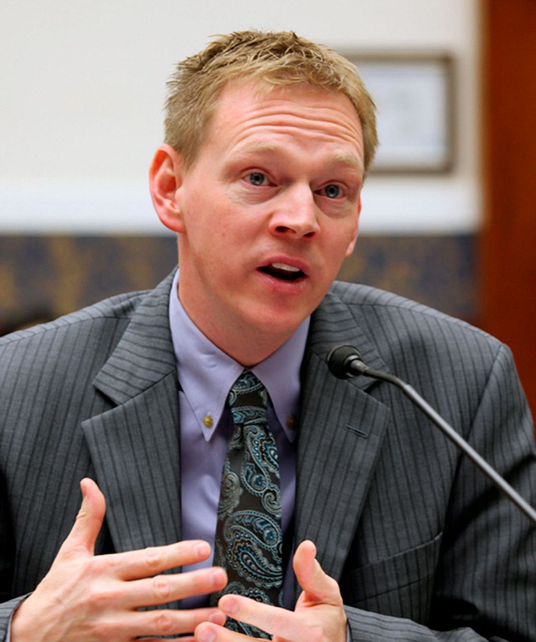 Former Iowa official wins $1.5M in discrimination case