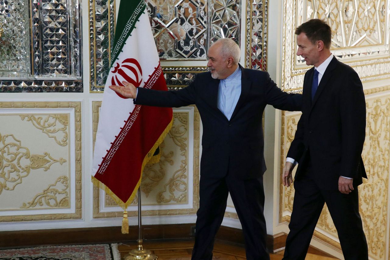 Britain's top diplomat in Iran as US oil sanctions back on