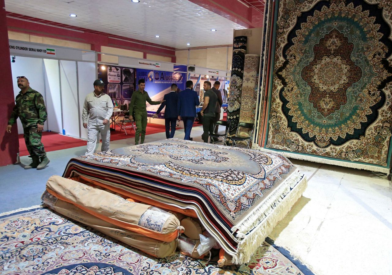 Iran, feeling sanctions bite, looks for outlet in Iraq