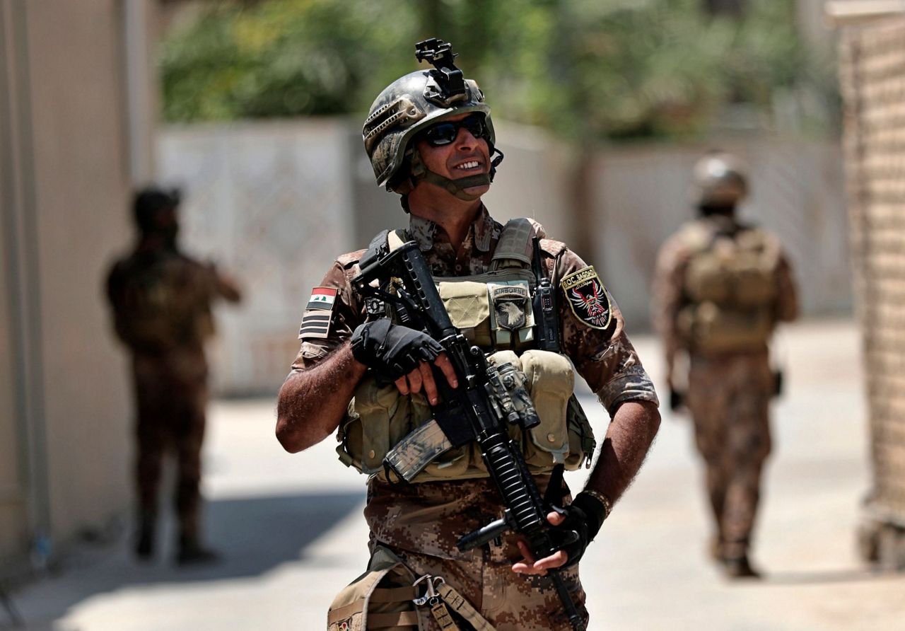 Iraqi forces clear farmland near Baghdad of IS militants
