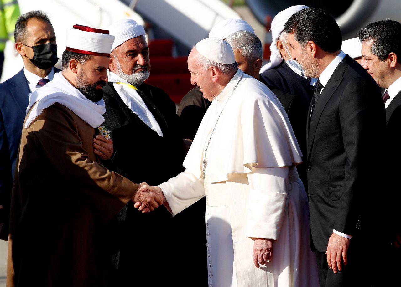 Pope visits Iraq's war-ravaged north on last day of tour