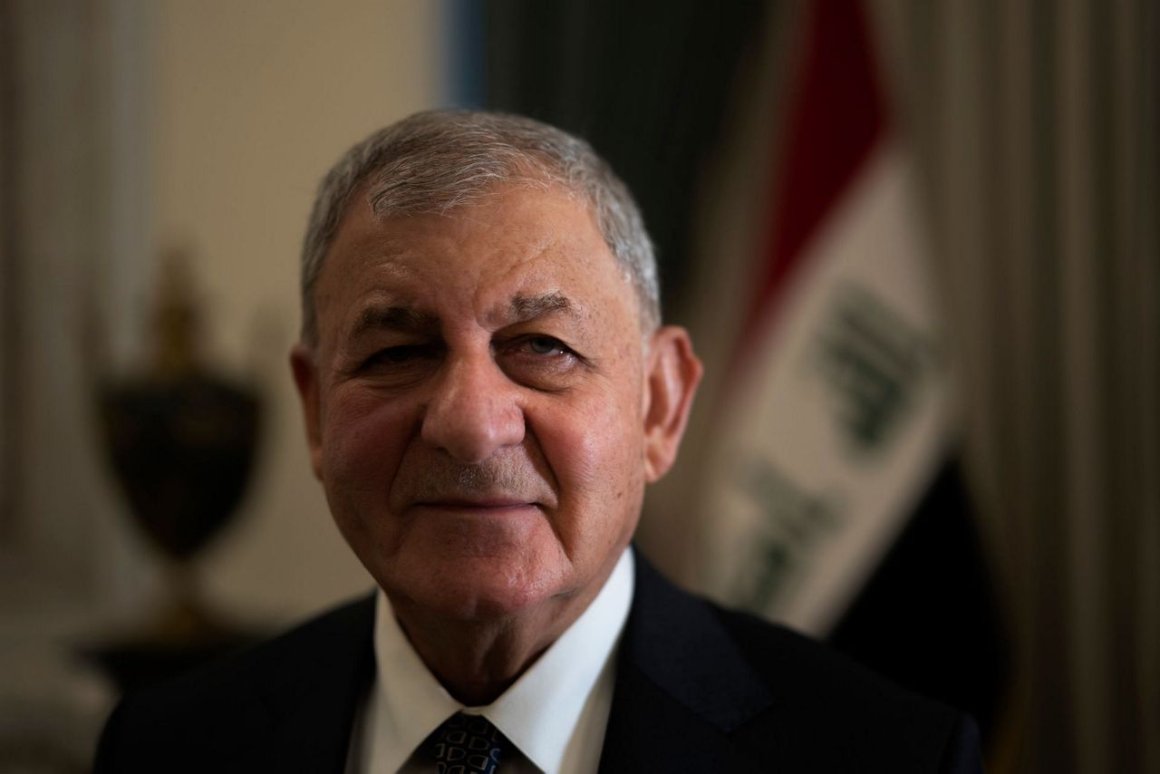 Iraqi president says country now peaceful, life is returning