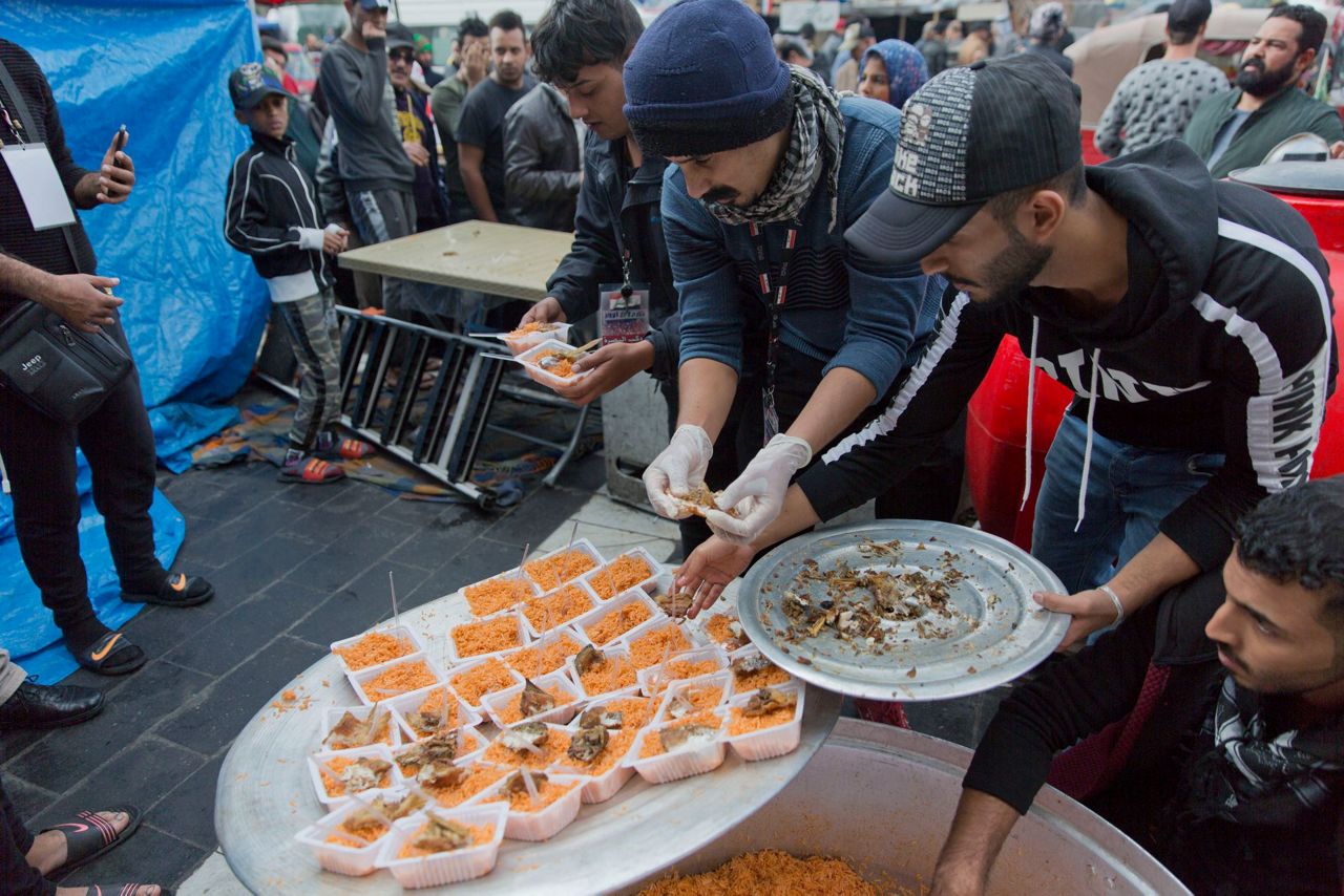 Home-cooked food in Iraqi square brings protesters together