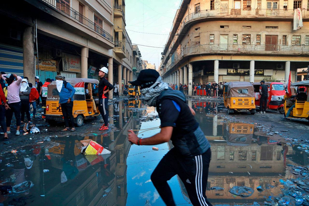 Century ago and today, Baghdad street a front line in revolt