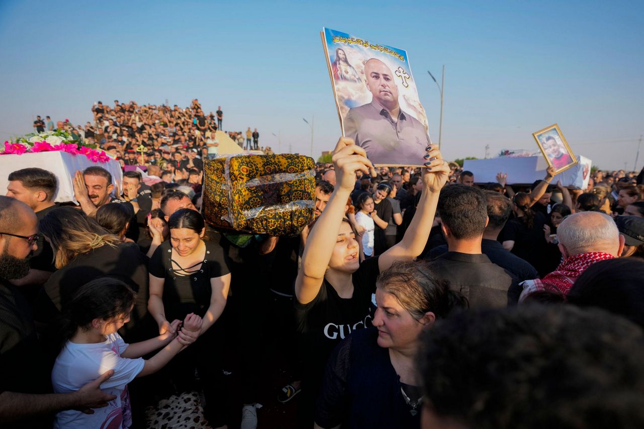 Fire at wedding hall in northern Iraq kills at least 100 people ...