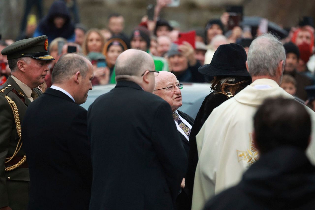 Crowds line Dublin streets for funeral procession of The Pogues singer ...