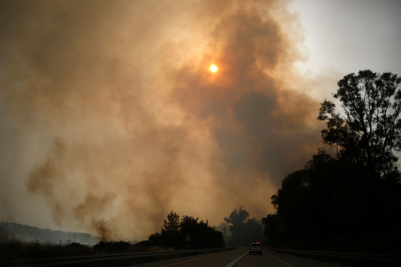 Wildfires sweep across Israel as heatwave grips region