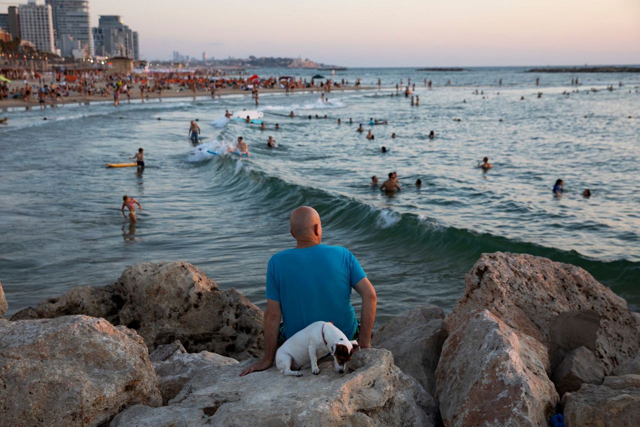 AP PHOTOS: Summer days at the beach, in Israel and Gaza
