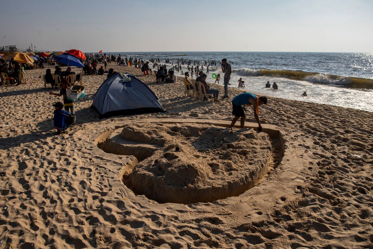 AP PHOTOS: Summer days at the beach, in Israel and Gaza