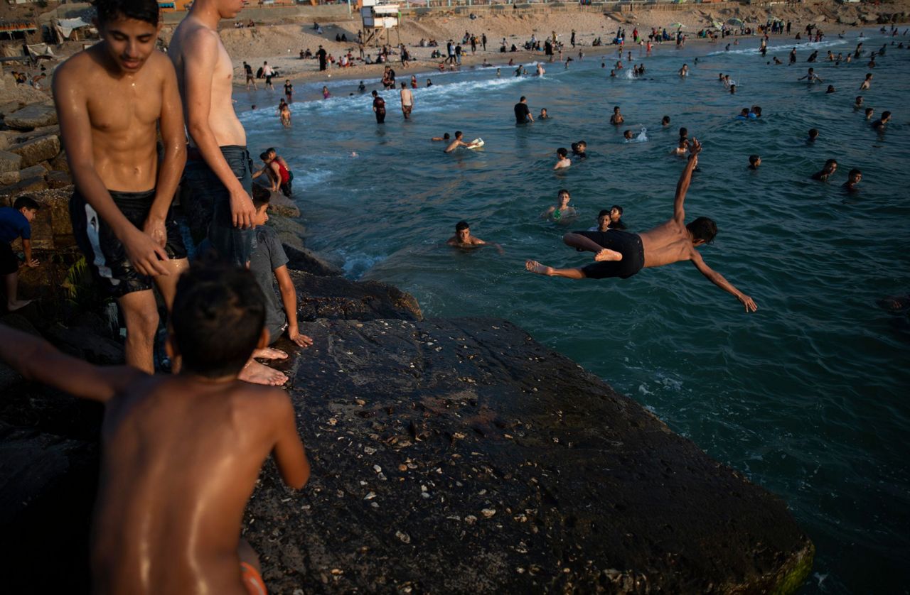 AP PHOTOS: Summer days at the beach, in Israel and Gaza