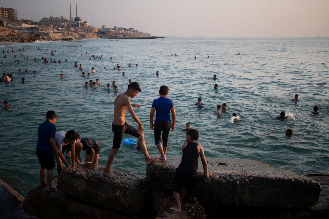 AP PHOTOS: Summer days at the beach, in Israel and Gaza
