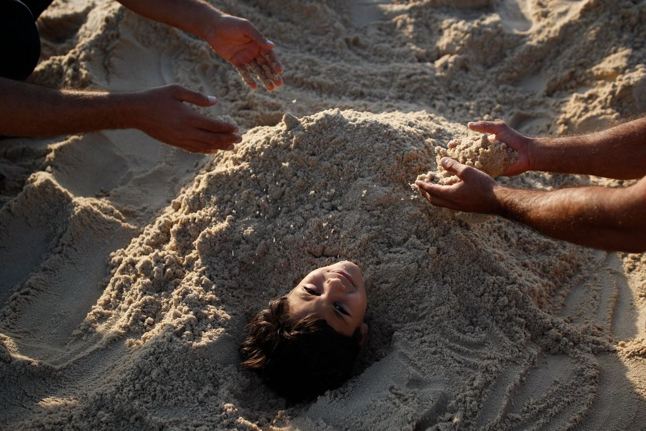 AP PHOTOS: Summer days at the beach, in Israel and Gaza