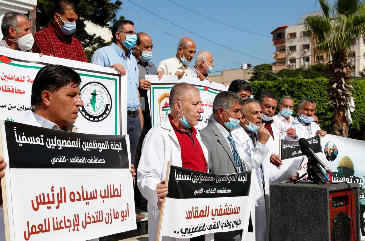 Gaza nurses protest loss of Israeli permit, layoffs