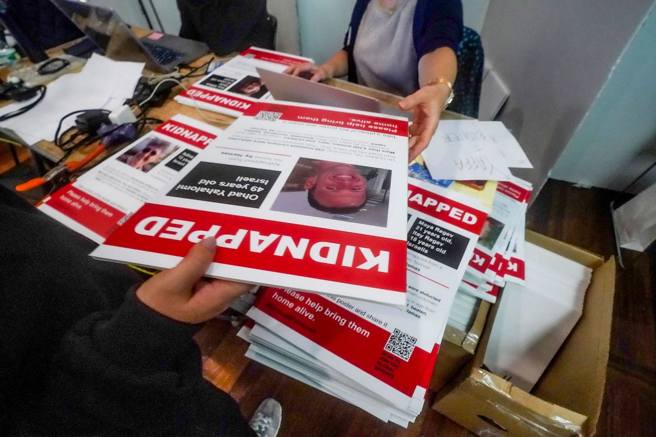 Artists' posters of hostages held by Hamas, started as public reminder ...