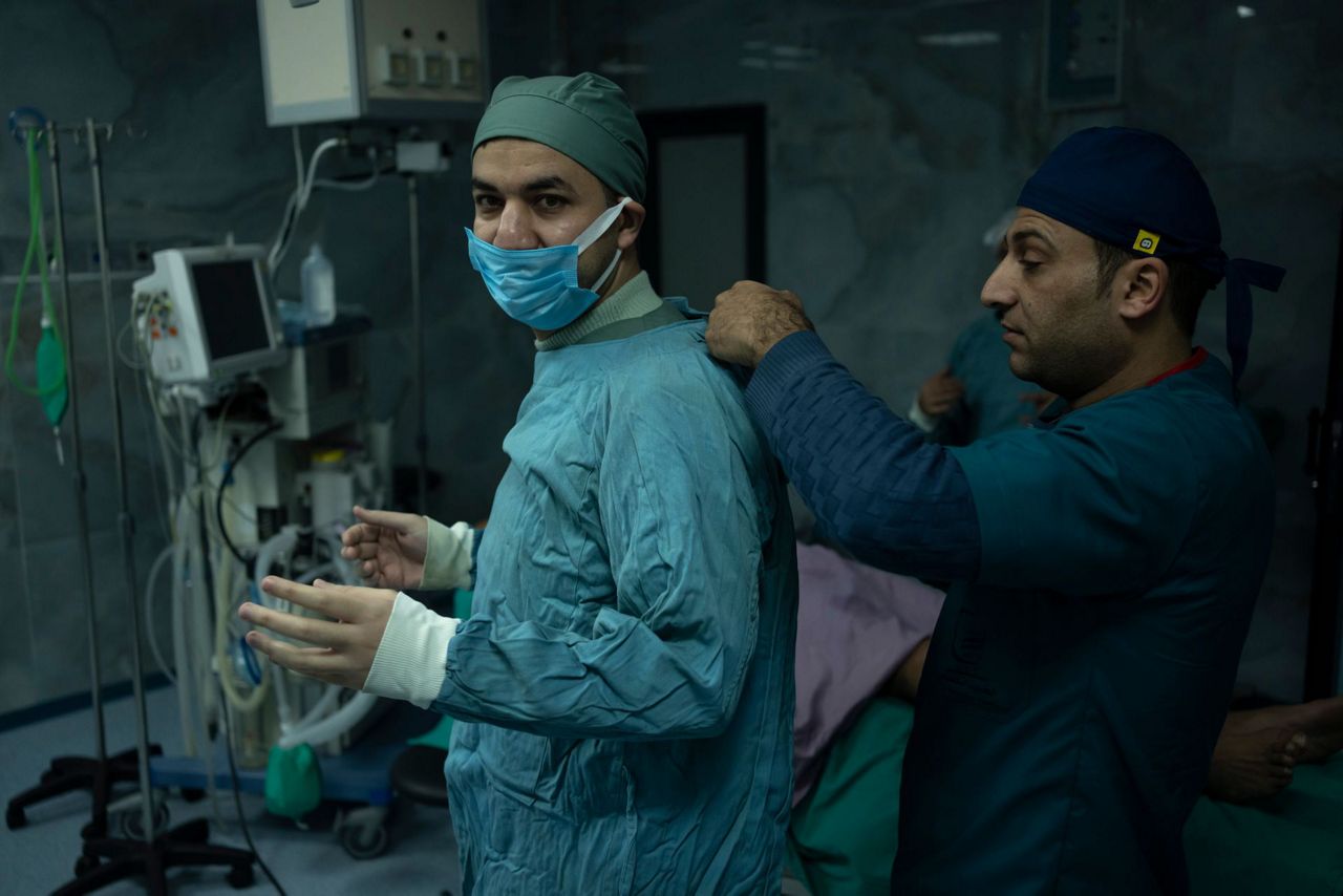 During 100 days of war, a Gaza doctor pushes through horror and loss in ...